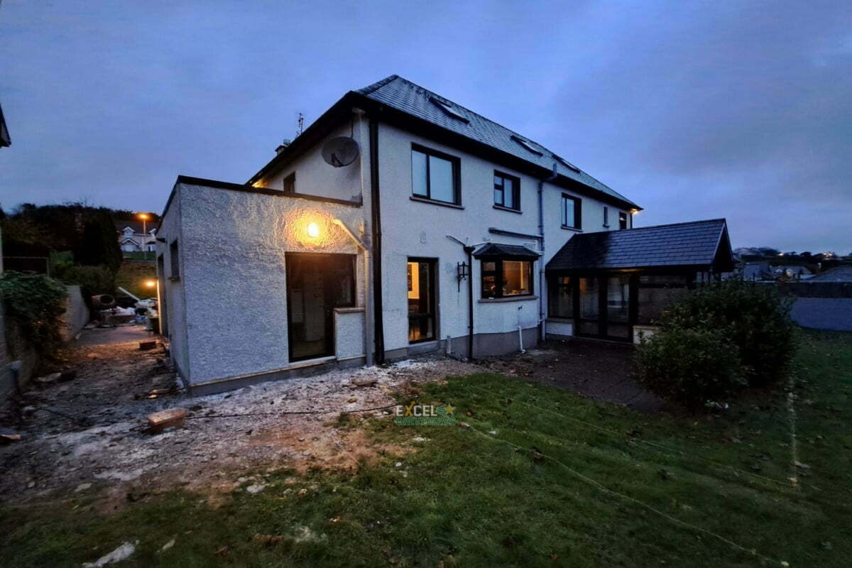 Patio with Silver Granite Slabs, Charcoal Border and Connemara Walling ...